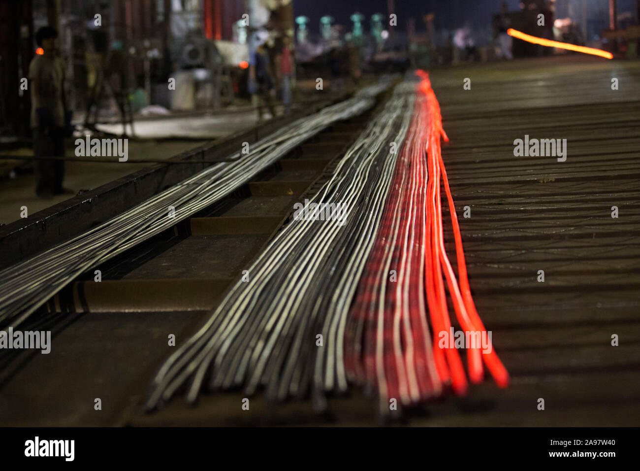 Heated metal pig gets squeezed and drilled at special metal forging ...