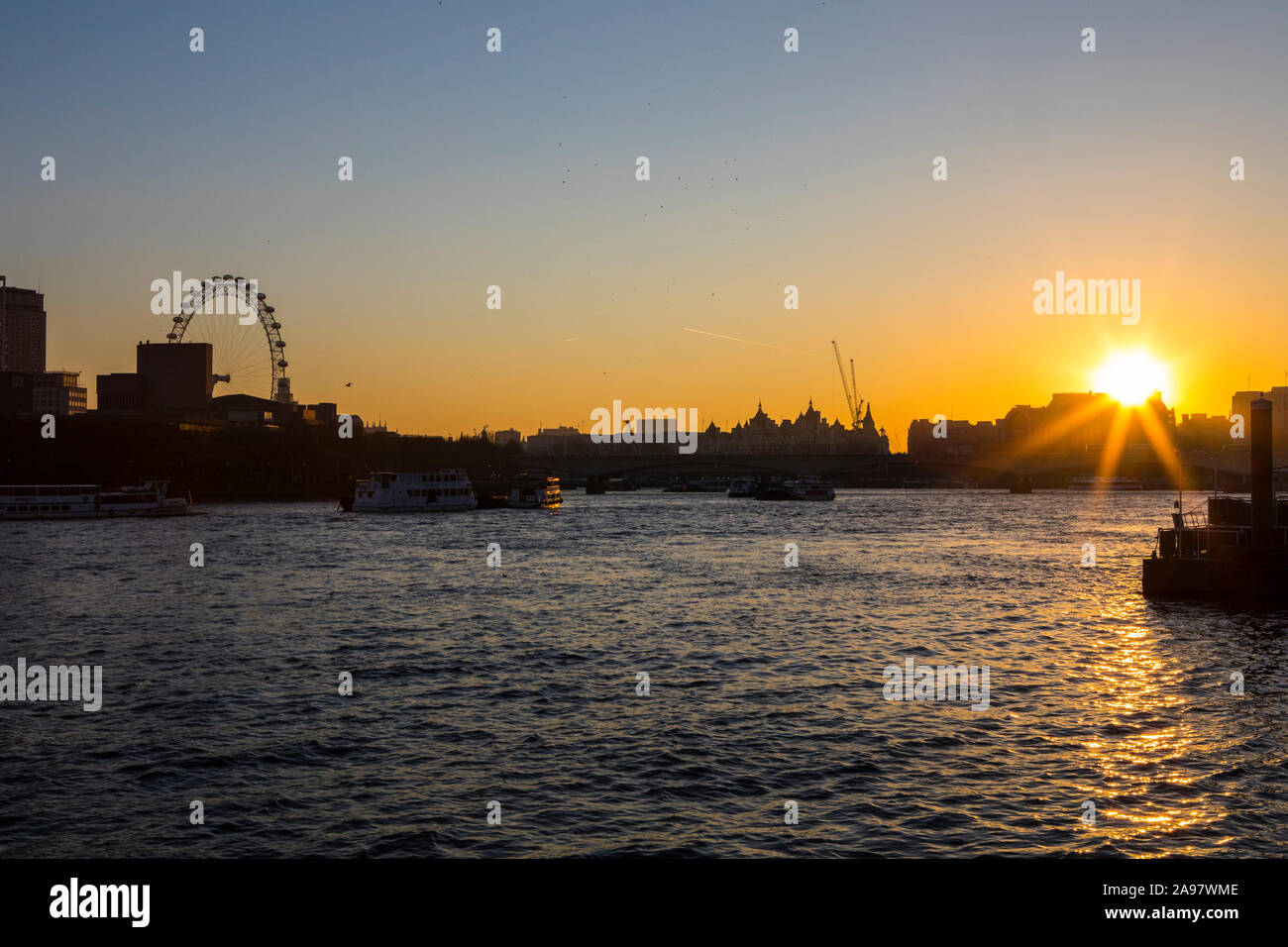 A view across the River Thames at dusk in London, UK Stock Photo - Alamy