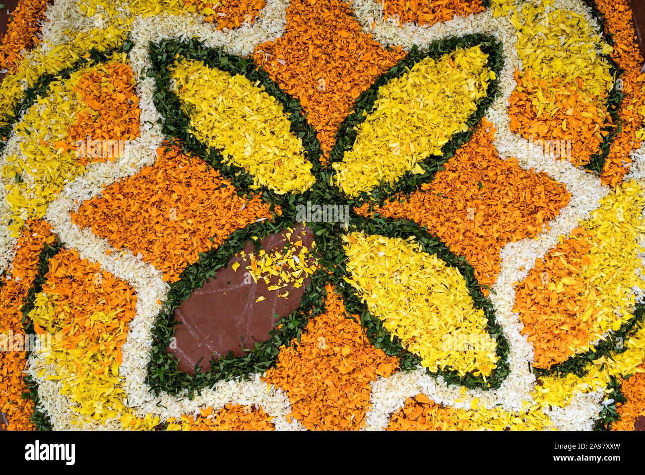 above view of onam pookalam flowers designs, traditional decoration for ...