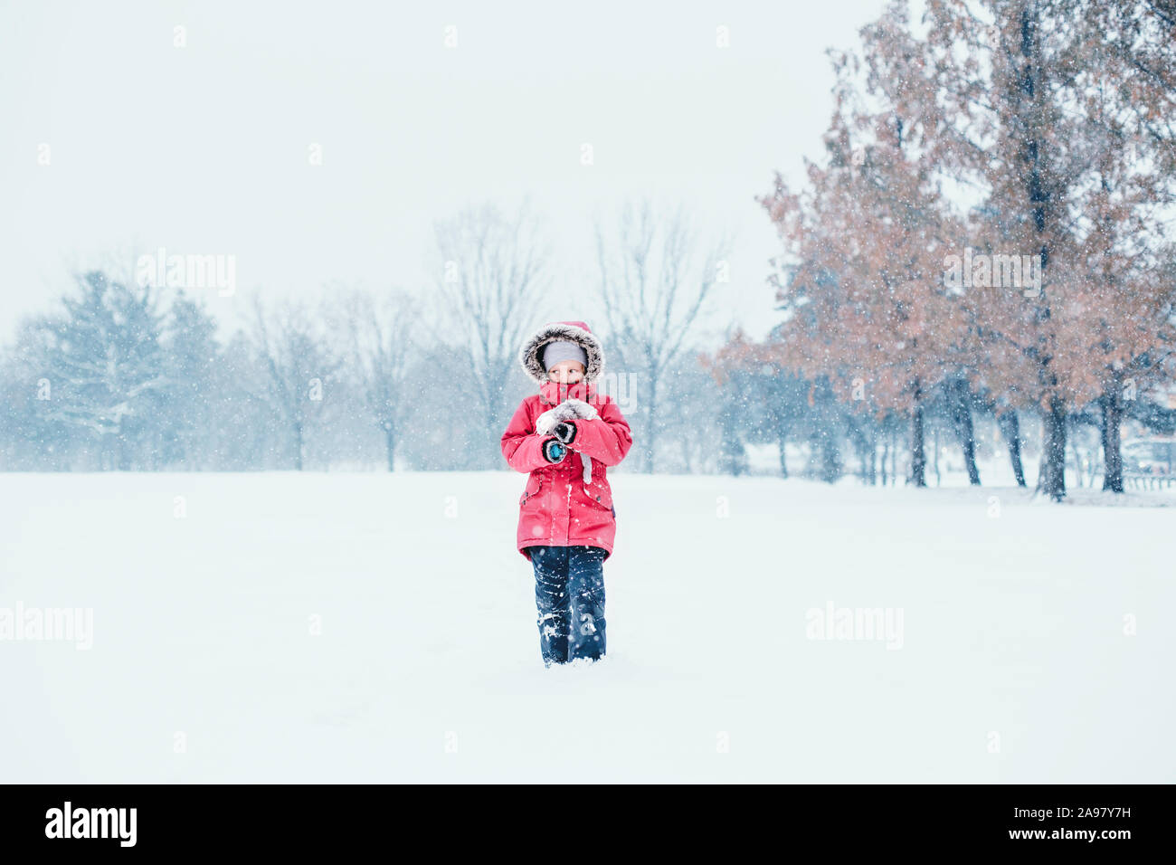 Cute adorable sad unhappy abandoned Caucasian frozen girl child with ...