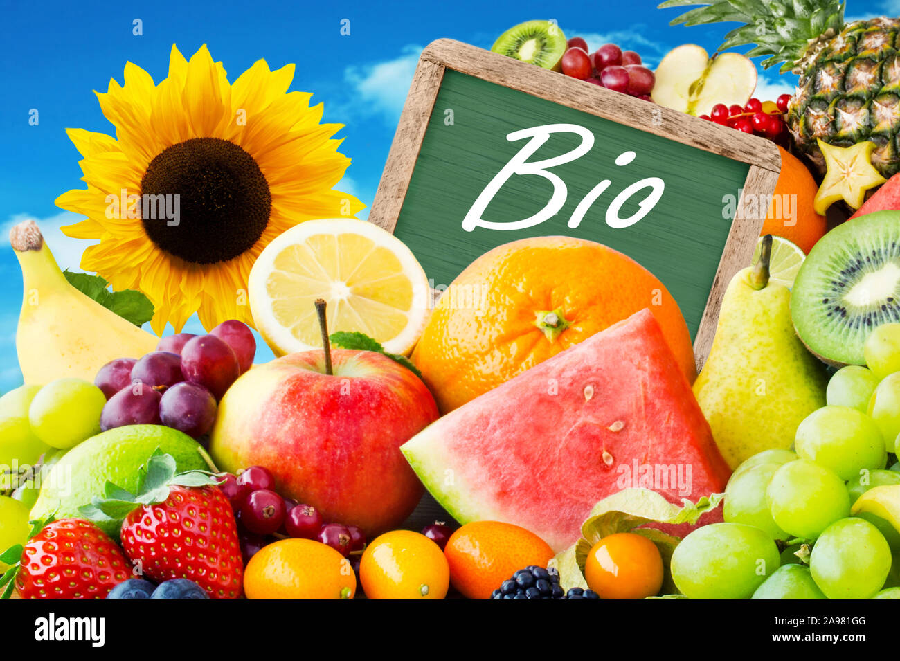 Fruits and sunflower with bio label Stock Photo - Alamy