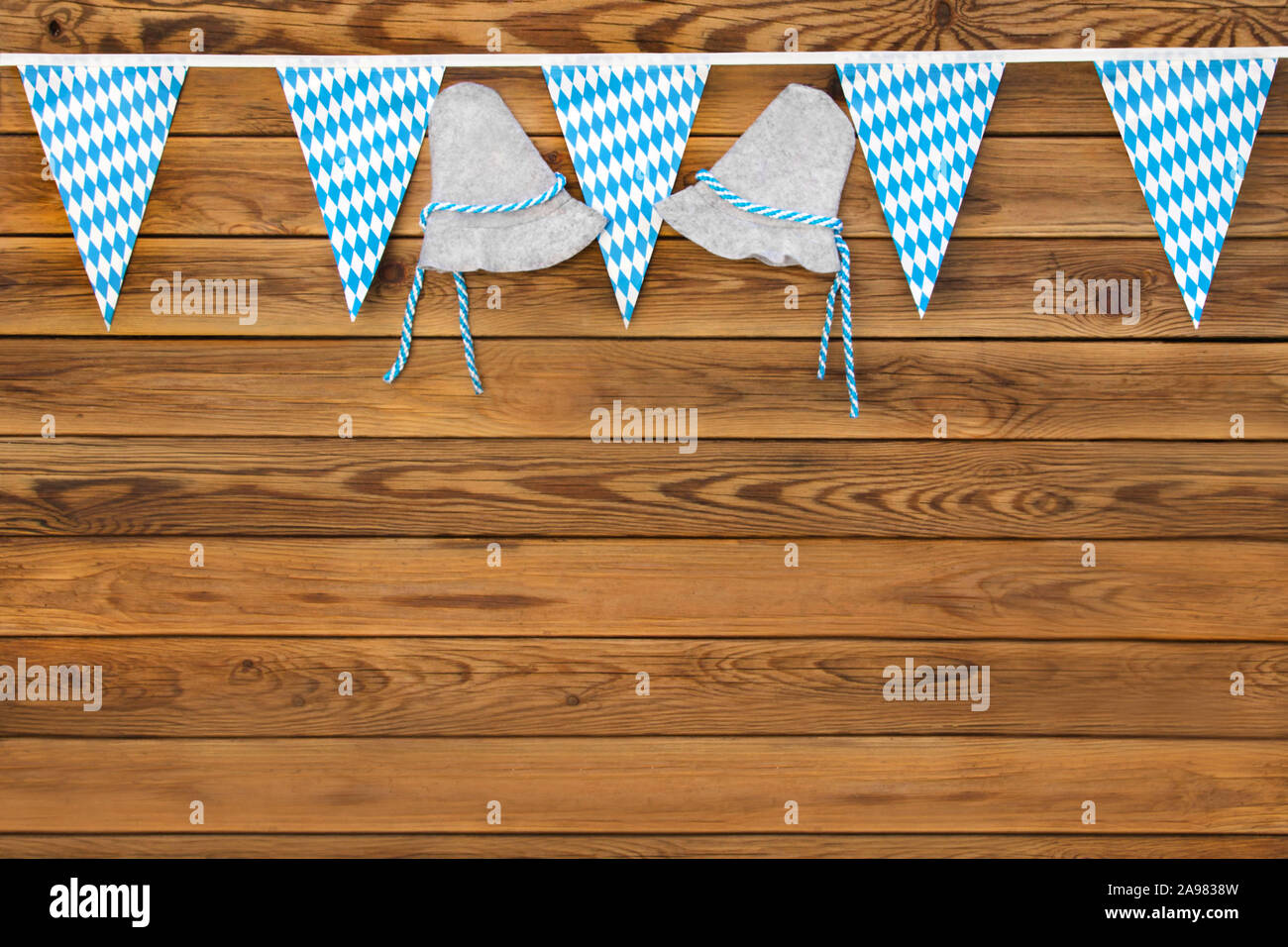 Bavarian flags and wooden background Stock Photo - Alamy