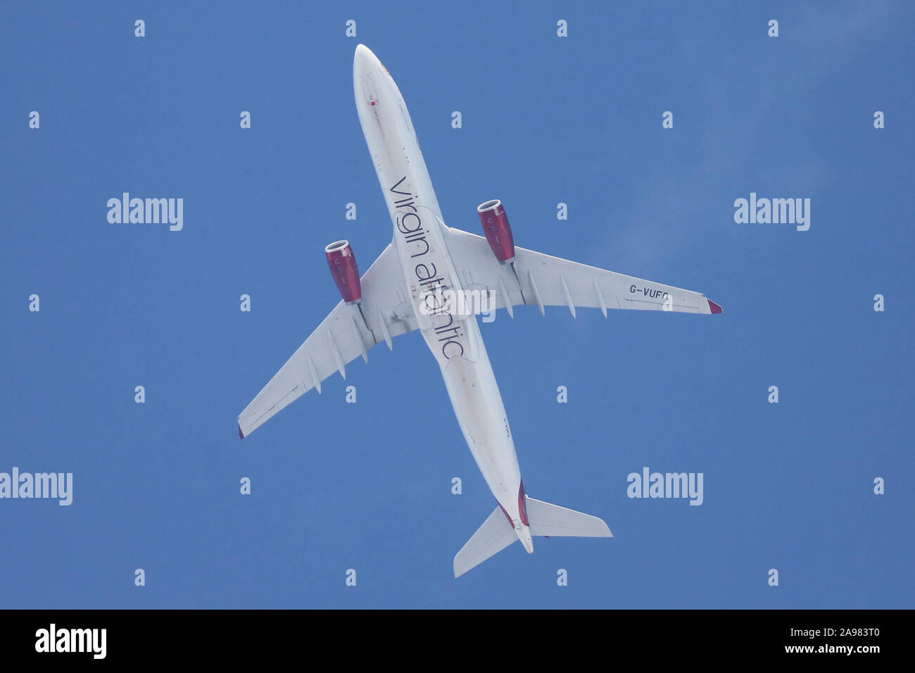 G-VUFO Virgin Atlantic Airbus A330 flying overhead, set against a blue ...