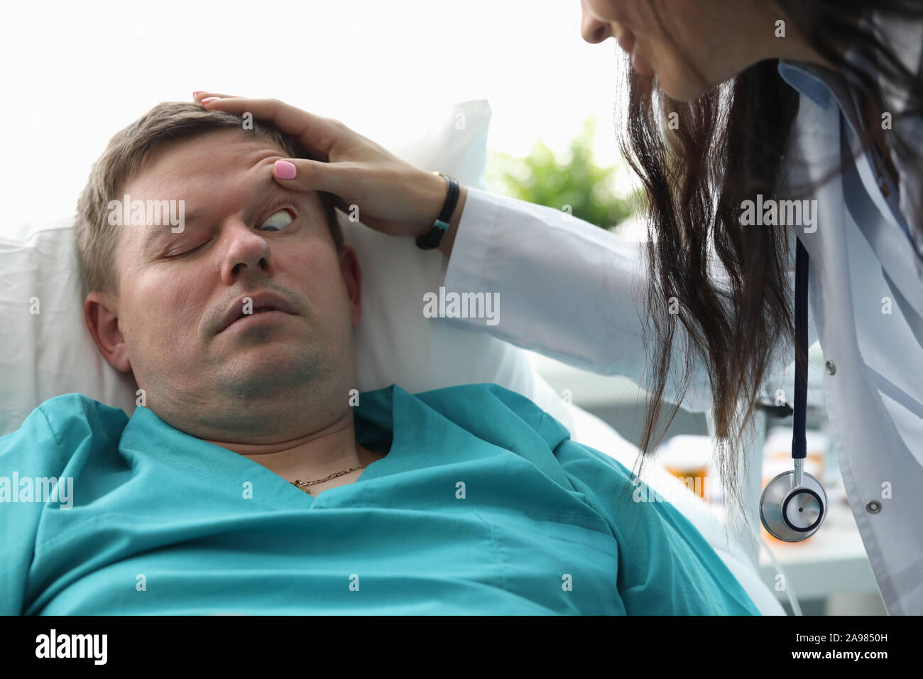 Doc doing medical checkup Stock Photo - Alamy