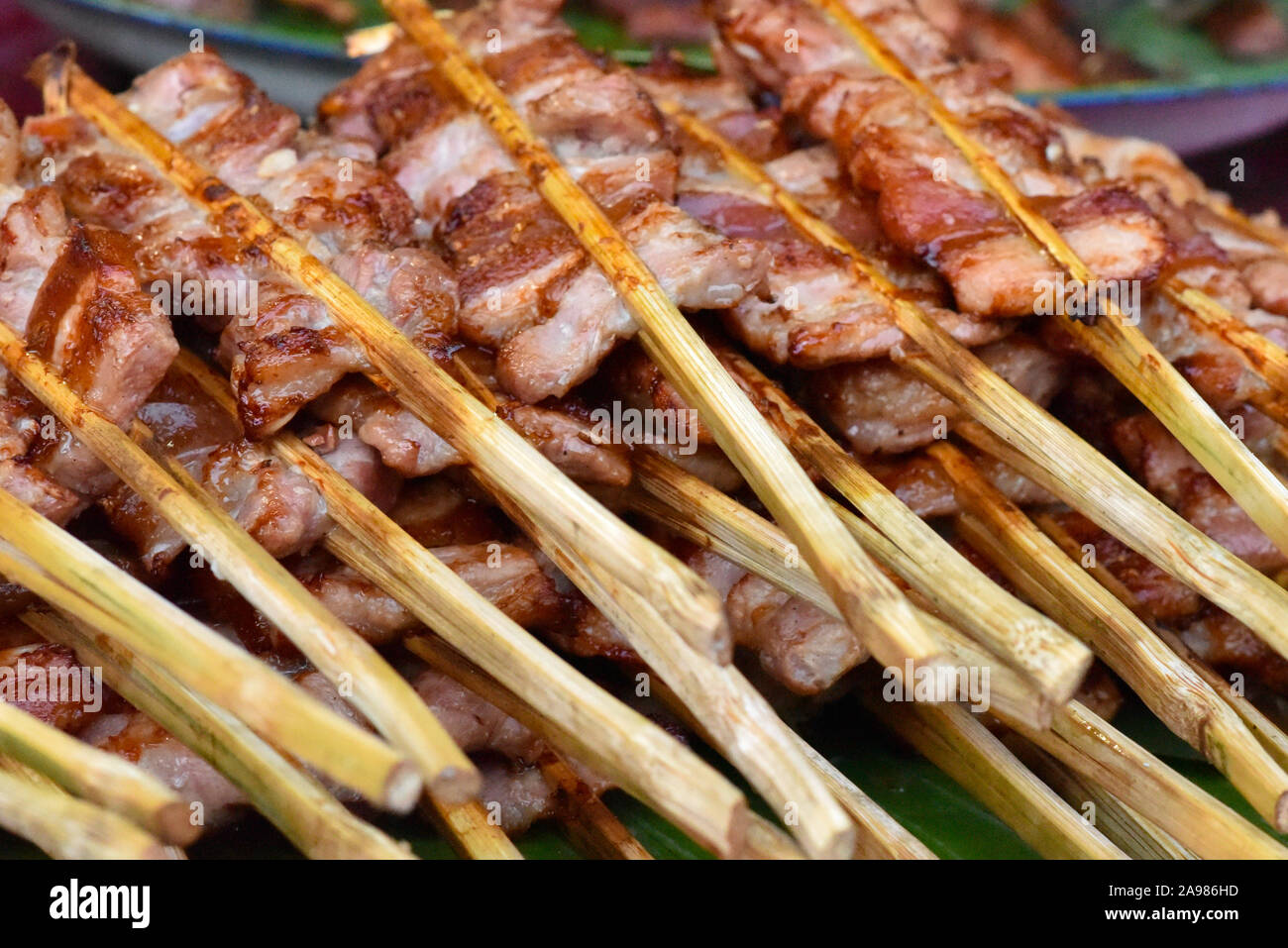 Meat barbecued on bamboo sticks, Luang Prabang, Laos Stock Photo - Alamy