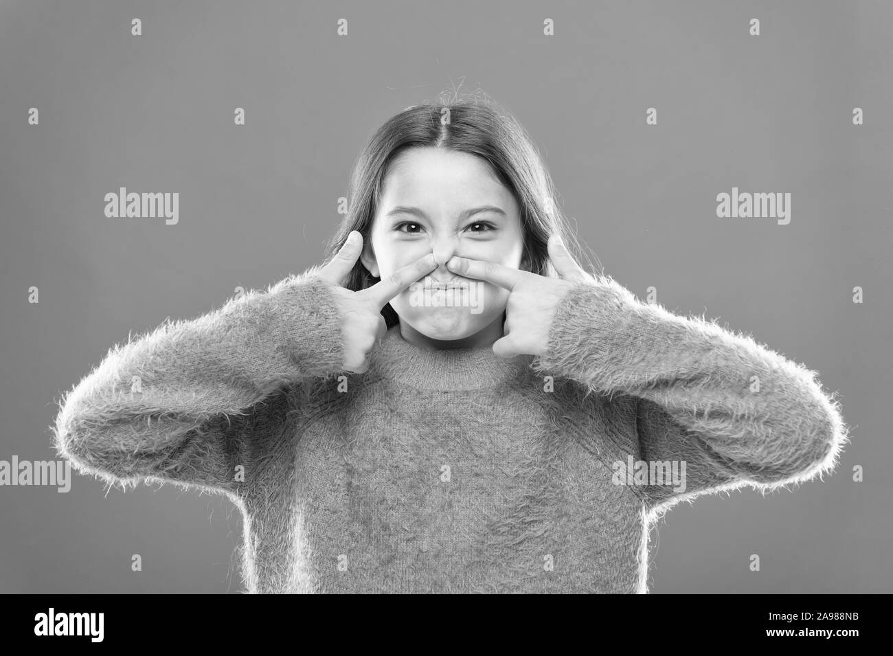 Face fitness concept. Funny grimace. Kid demonstrate massage face skin ...