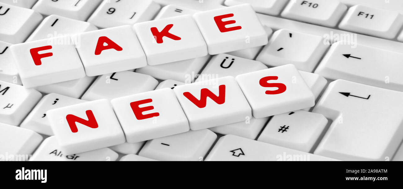 Fake News and PC background Stock Photo - Alamy