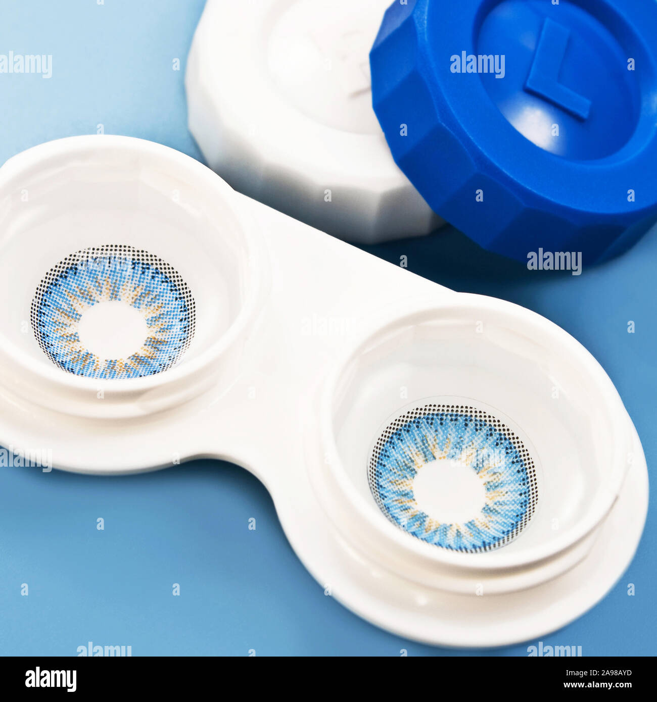 Blue contact lenses hi-res stock photography and images - Alamy