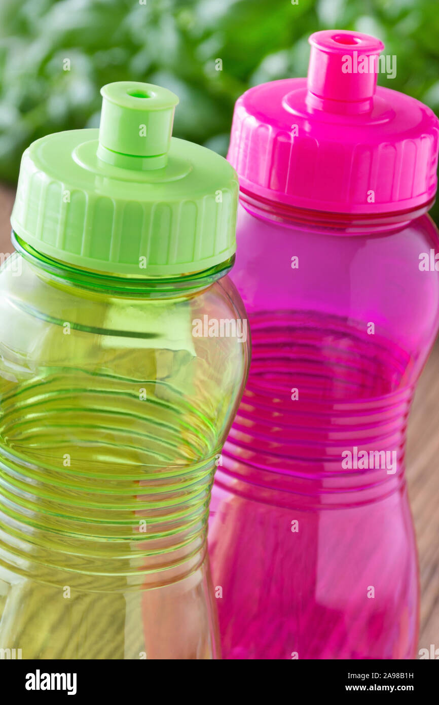Two Plastic drinking bottles close up Stock Photo - Alamy