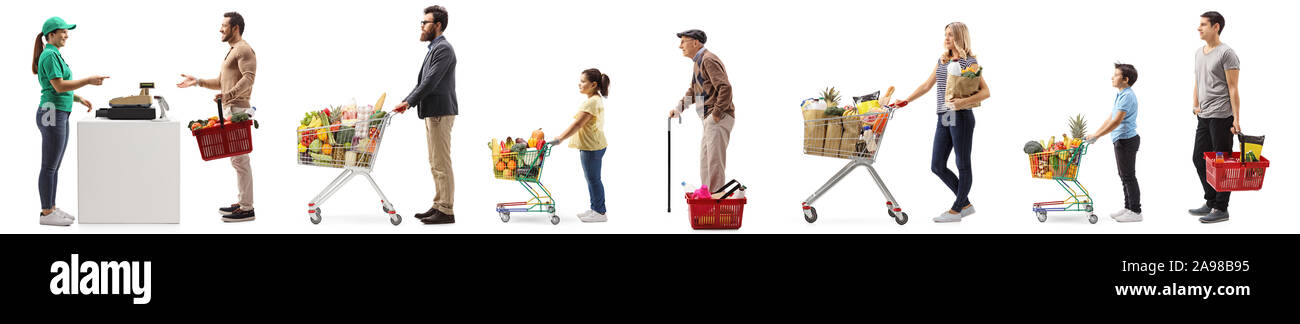 People with shopping carts and baskets waiting in line at the cash ...