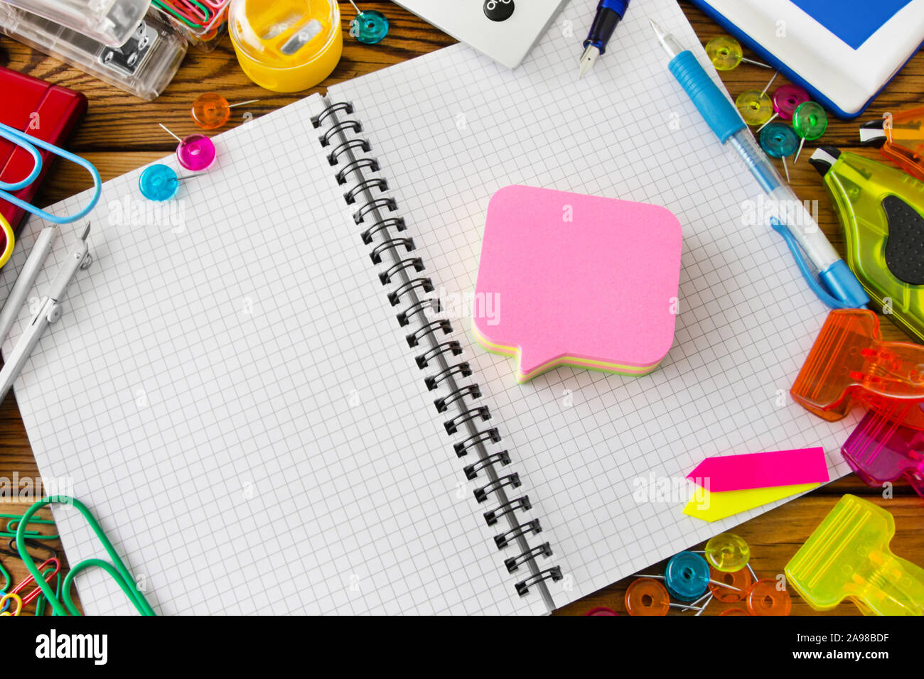 Desk and colorful stationery Stock Photo - Alamy