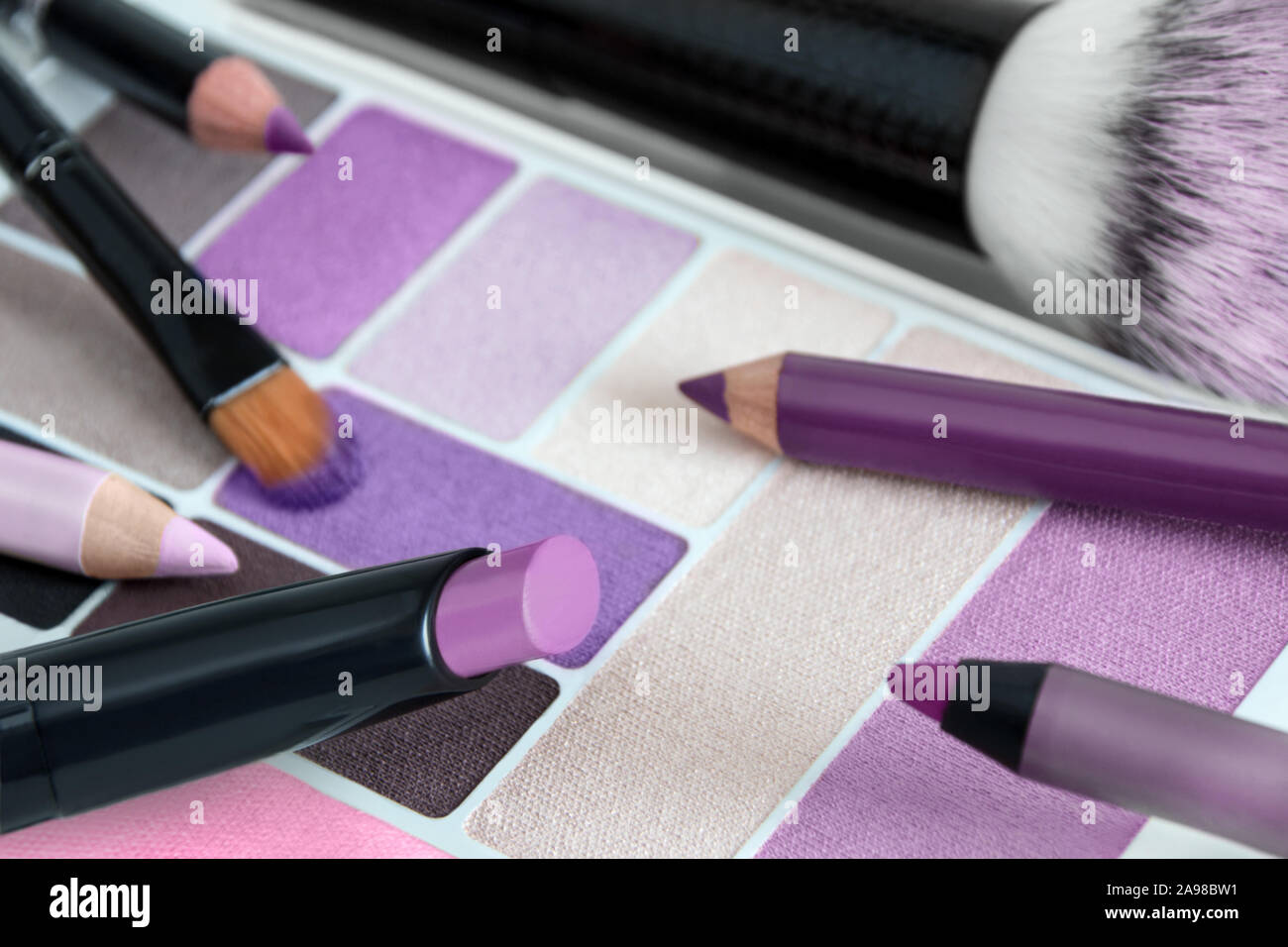 Make up cosmetics products violet Stock Photo - Alamy