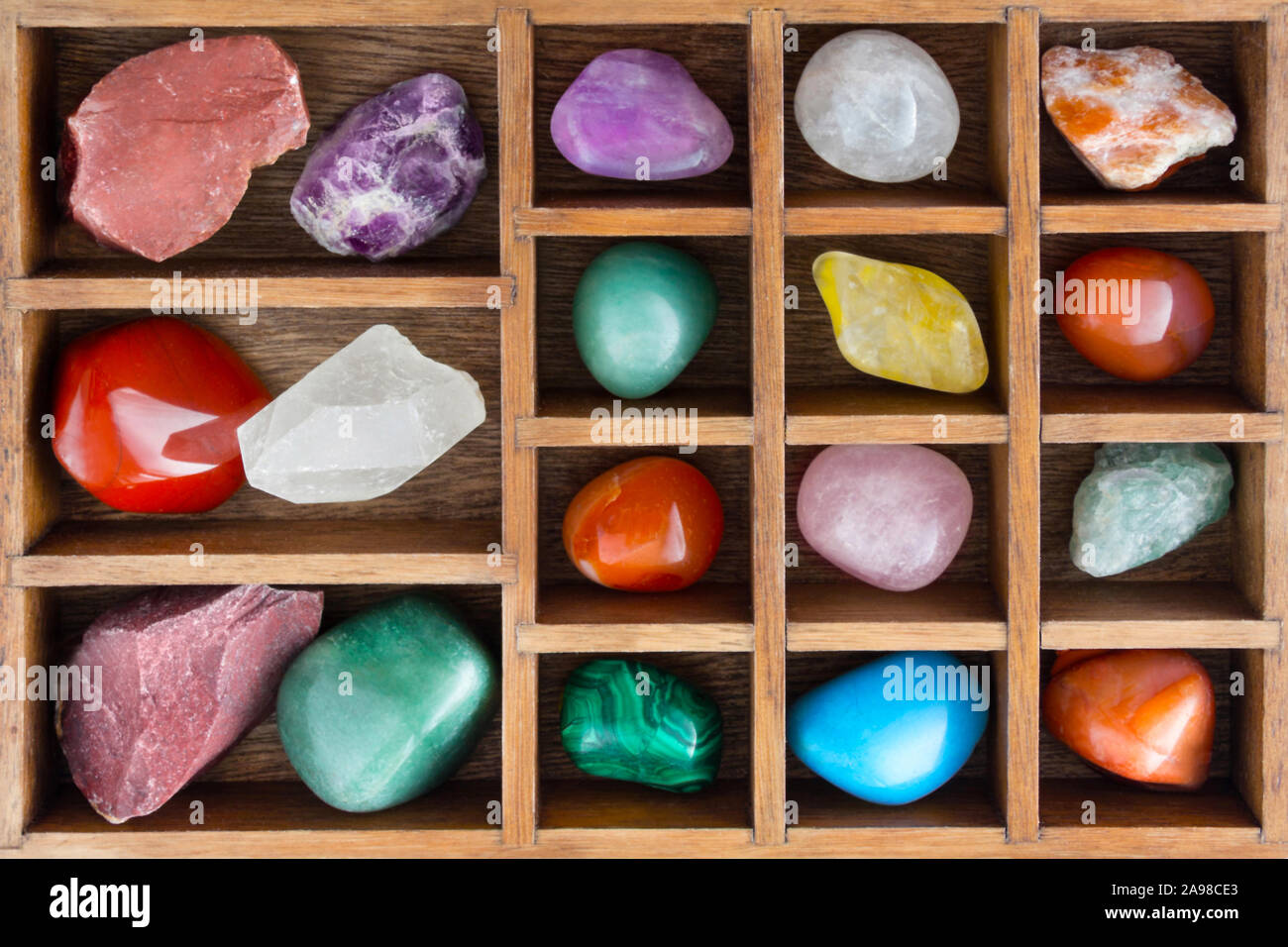 Gemstones and wooden box Stock Photo - Alamy