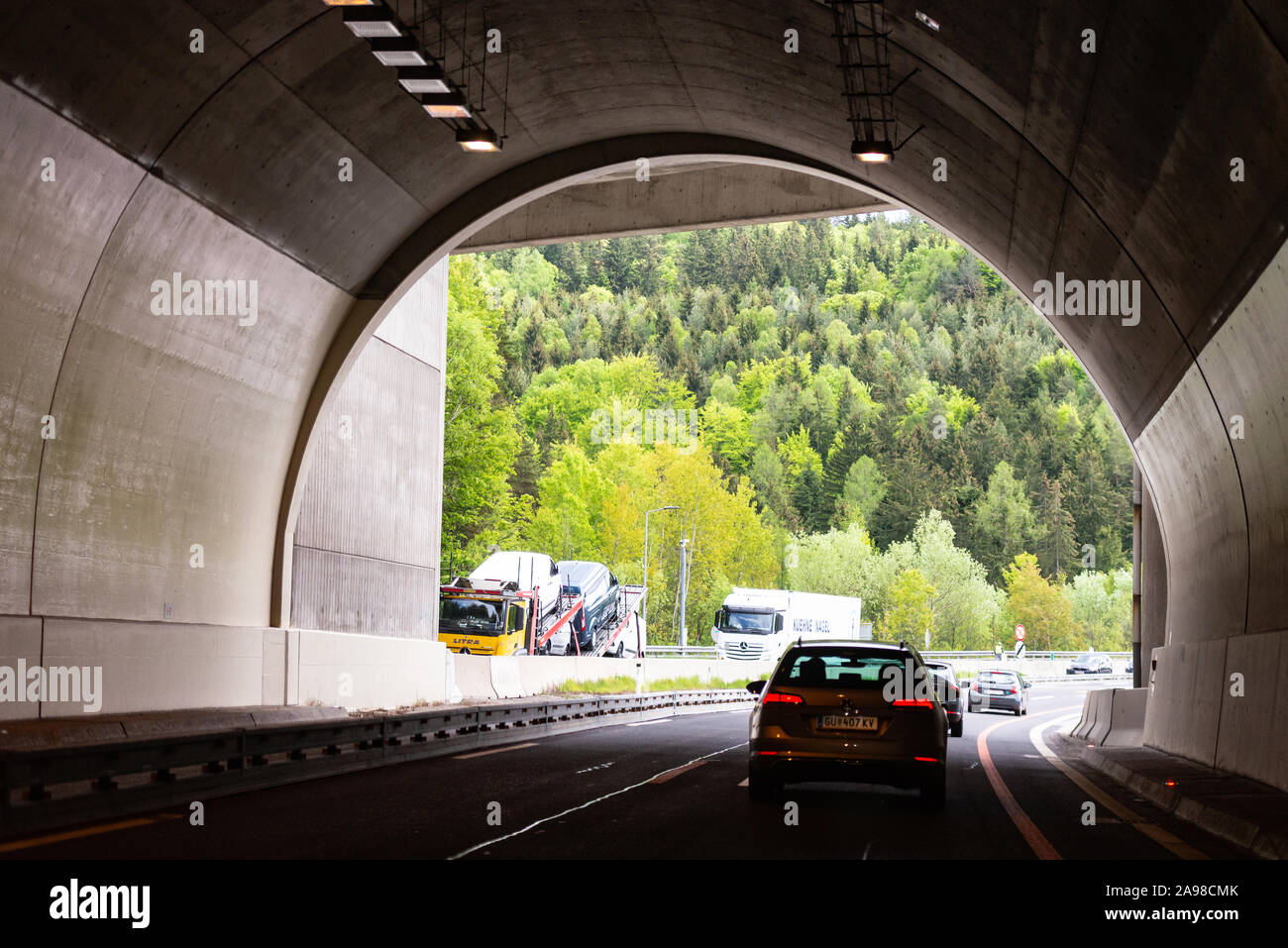 Roads Of Austria. Austrian highway with tunnels. Exit the tunnel. Photo from the car Stock Photo ...