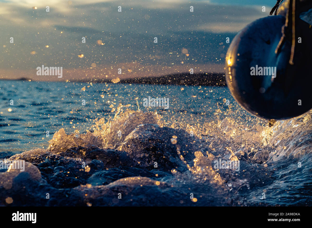 Water splashing next to the boat in croatia Stock Photo - Alamy