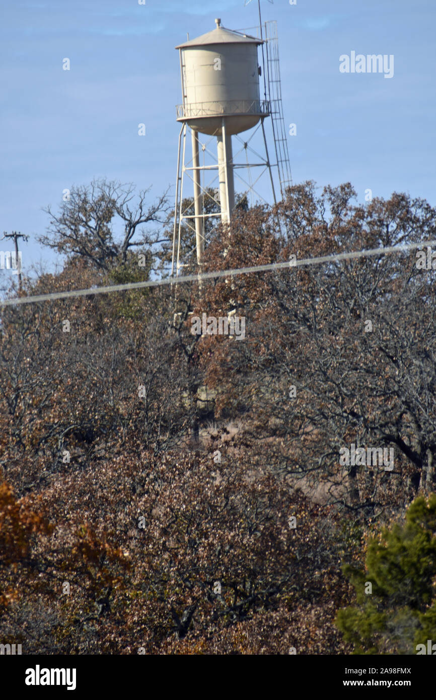 Water Tower in Woods Stock Photo - Alamy