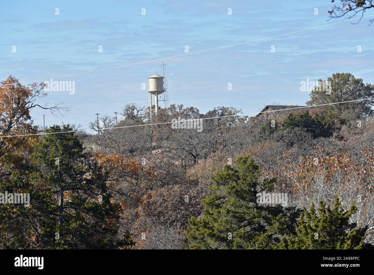 Water Tower in Woods Stock Photo - Alamy