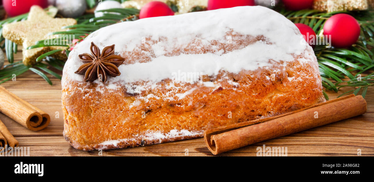 German Christstollen cake and decorations Stock Photo - Alamy