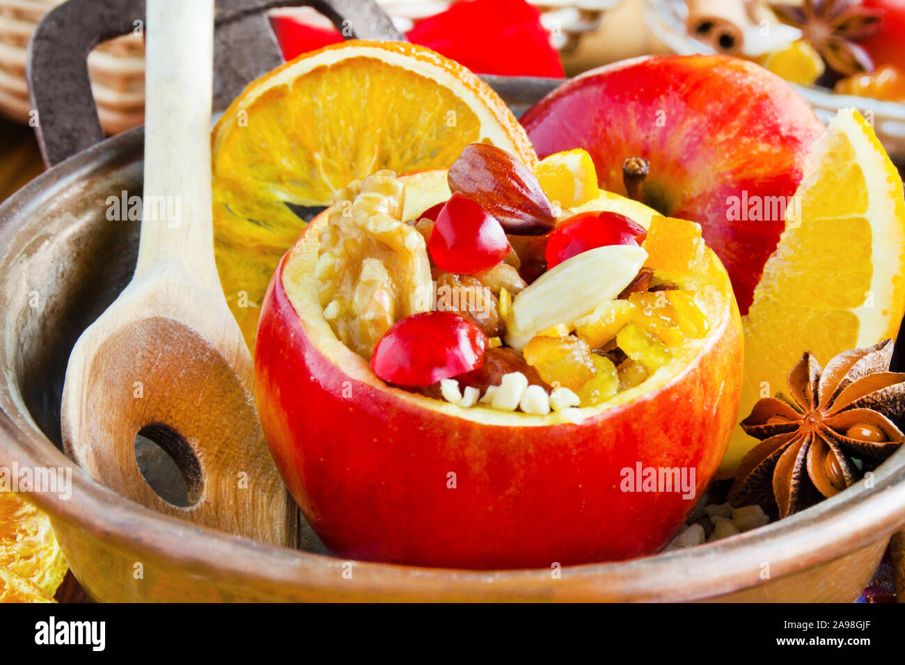 Baked apple and spoon Stock Photo - Alamy