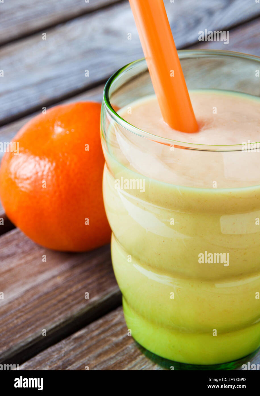 Milk yoghurt tangerine drink Stock Photo - Alamy