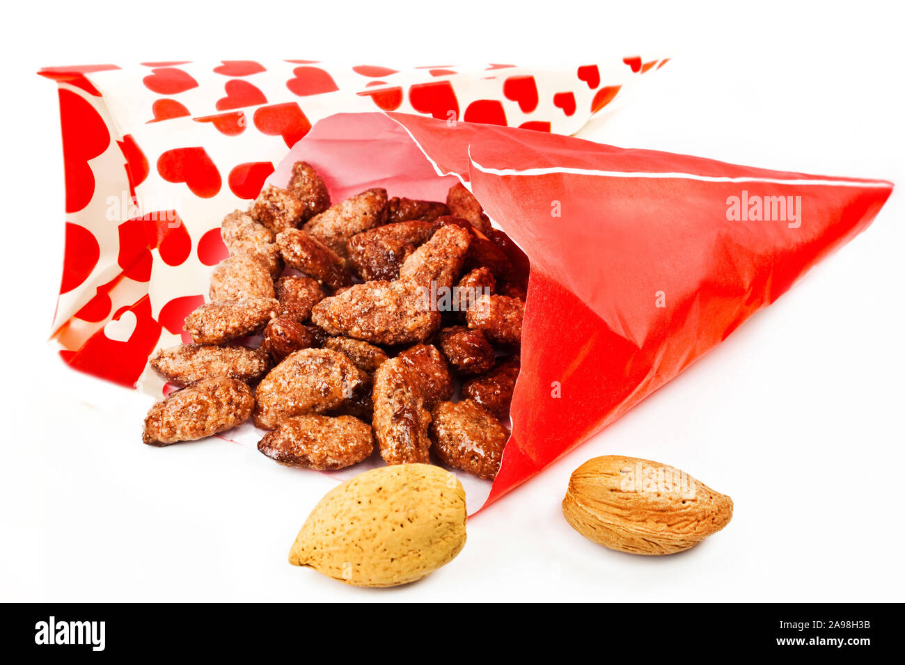 Roasted almonds and red bag Stock Photo - Alamy