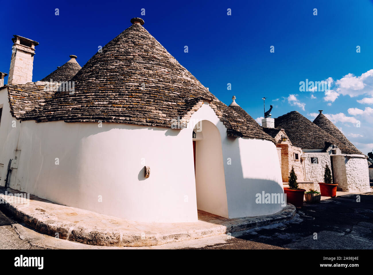 Beautiful single-storey houses of rounded construction called trulli ...