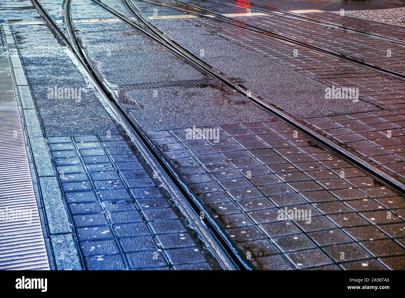 tram rails on the asphalt Stock Photo - Alamy