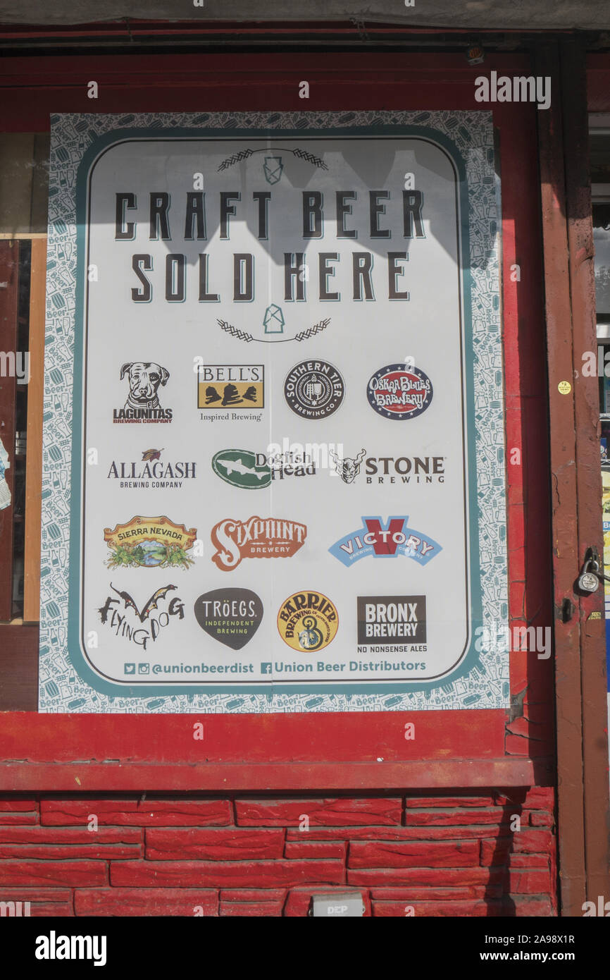 Sign advertising different craft beers on a store in Brooklyn, New York ...