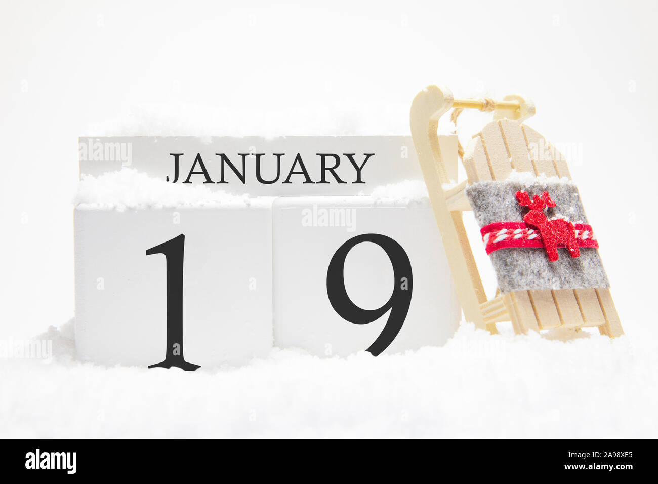 Wooden calendar for January, 19 th day of the winter month. The symbols ...