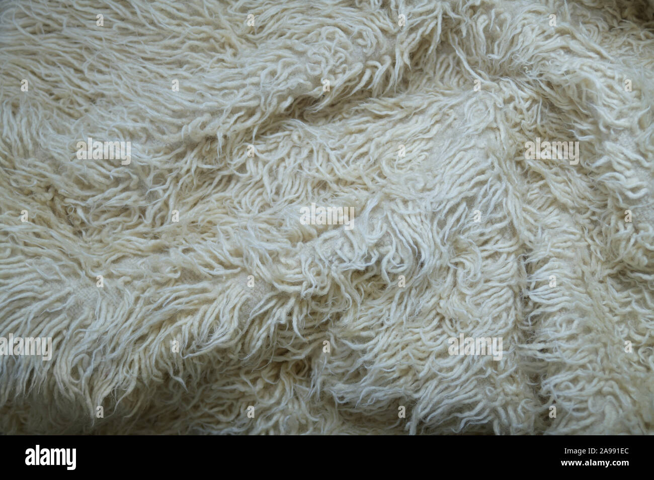 Cozy fluffy background in cream tones. White wool with white top ...