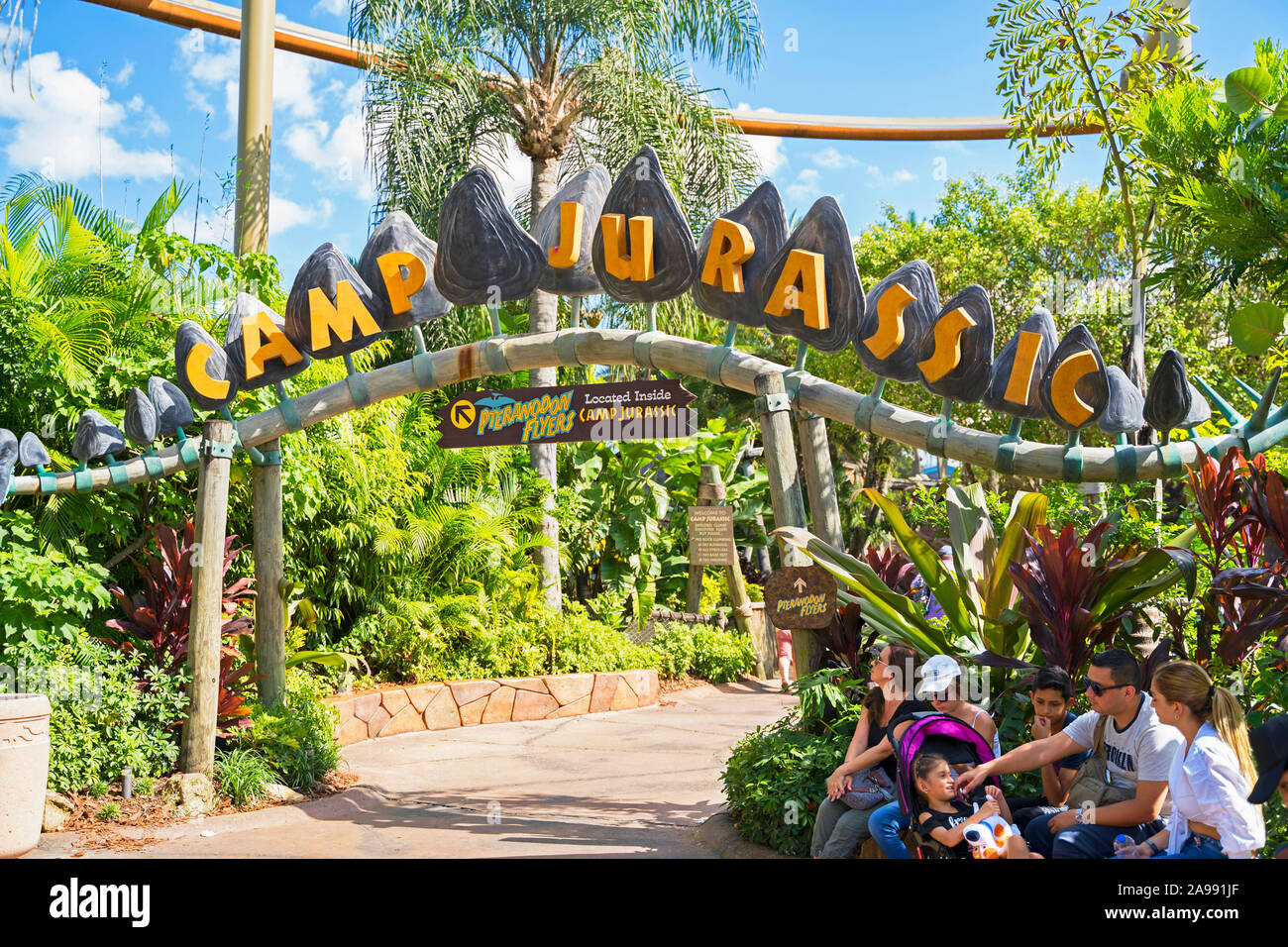 sign-and-entrance-to-camp-jurassic-people-sitting-resting-islands-of ...