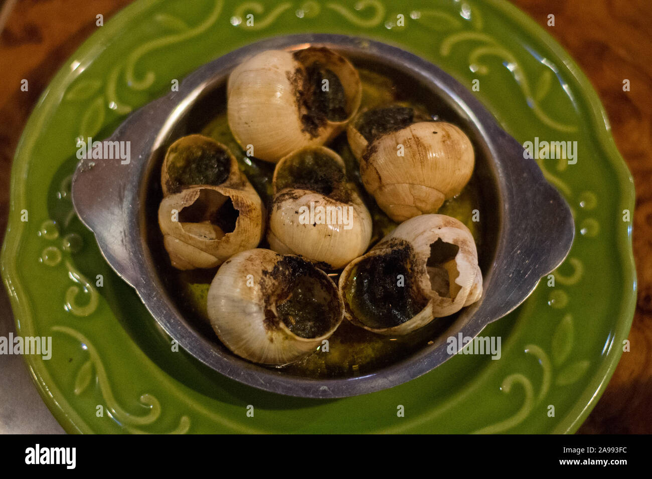 Escargots Bourguignonne Snails baked the traditional French way Stock ...