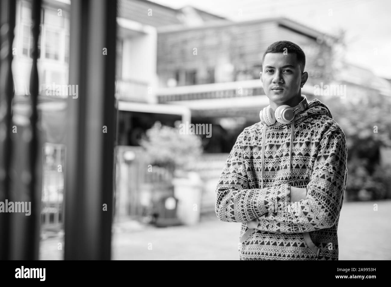 Young multi ethnic Asian man outdoors in black and white Stock Photo ...