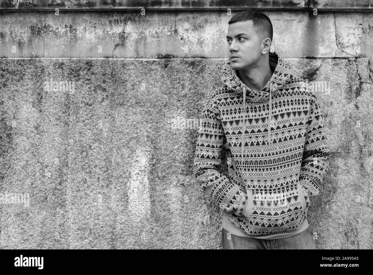 Young multi ethnic Asian man outdoors in black and white Stock Photo ...