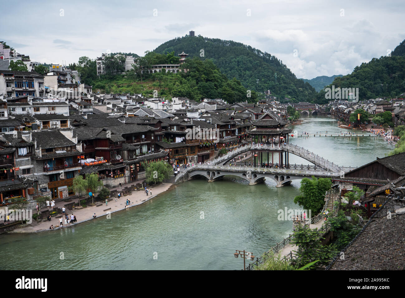 Scenic river side view of FengHuang Old Town or Phoenix Ancient Town ...