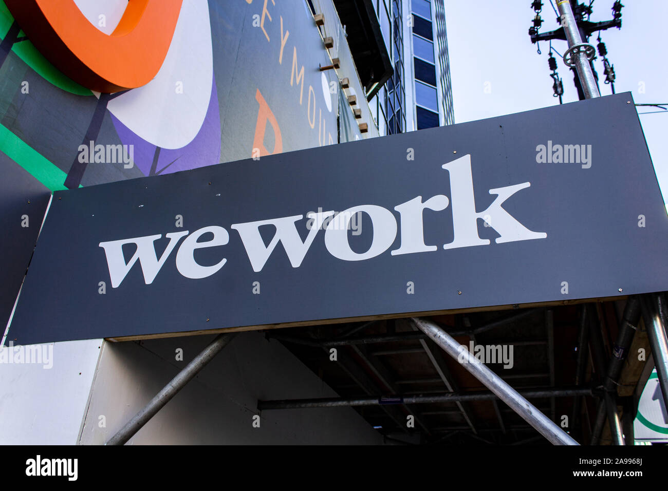 WeWork sign at a construction site of new building Stock Photo - Alamy