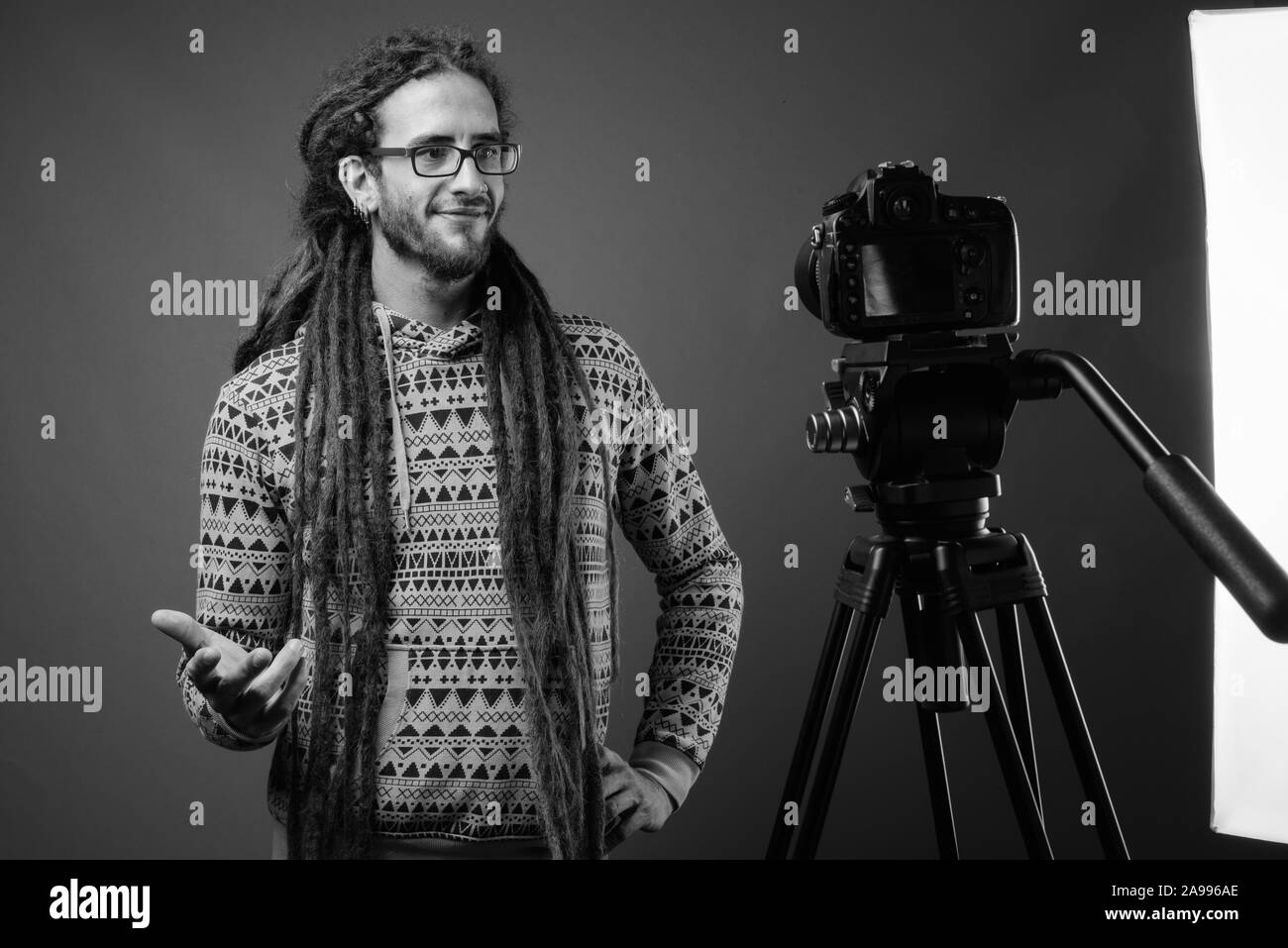 Young handsome Hispanic man with dreadlocks in black and white Stock ...
