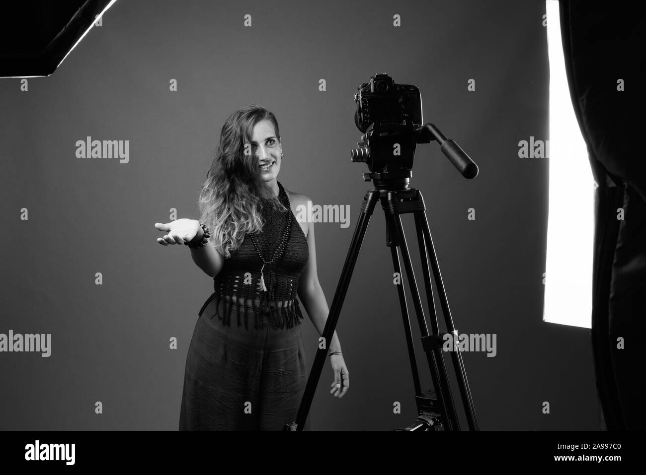 Happy fashion woman photographer Black and White Stock Photos & Images ...