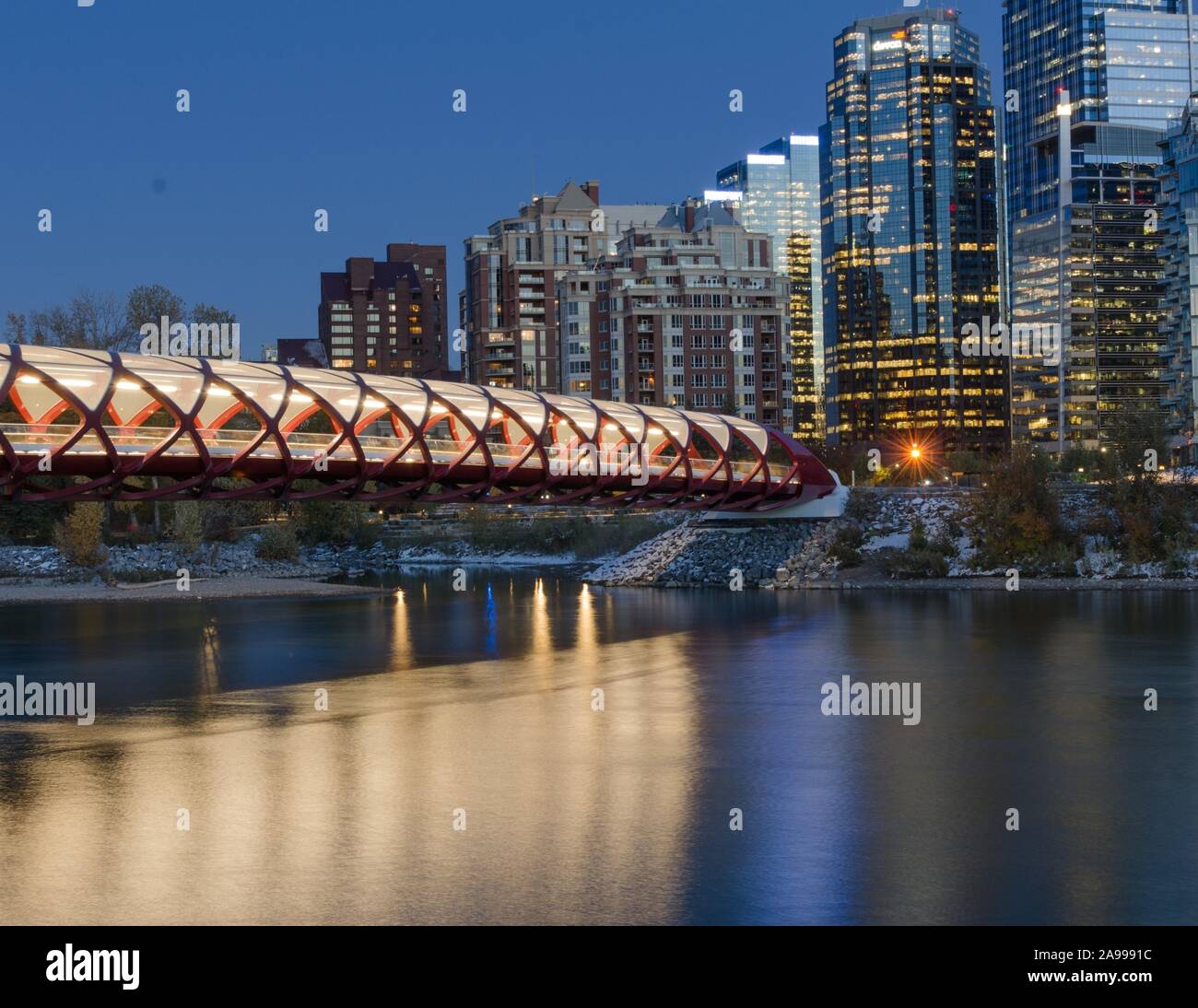The Peace Bridge across the Bow River in downtown Calgary, Alberta ...