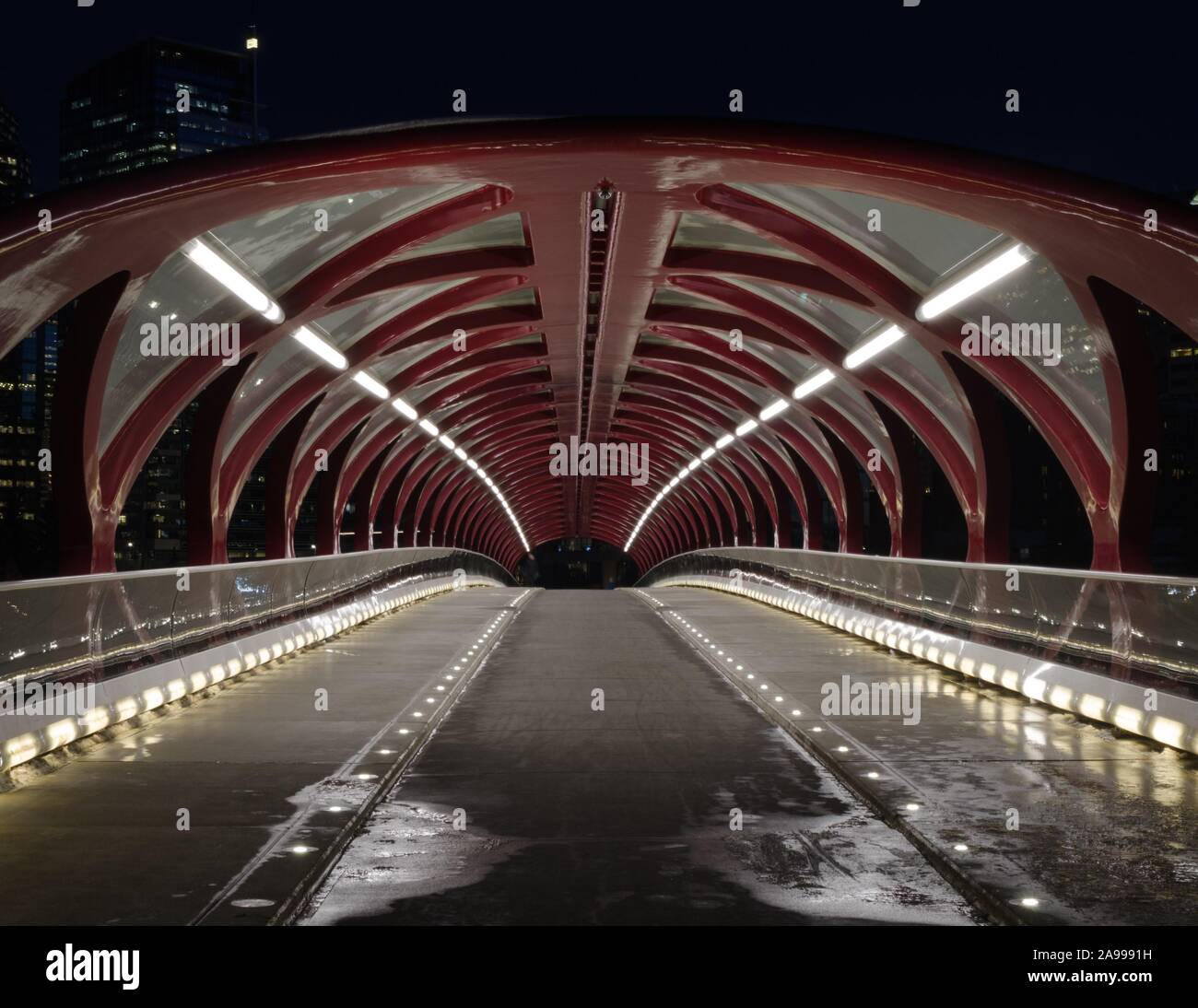 The Peace Bridge across the Bow River in downtown Calgary, Alberta ...