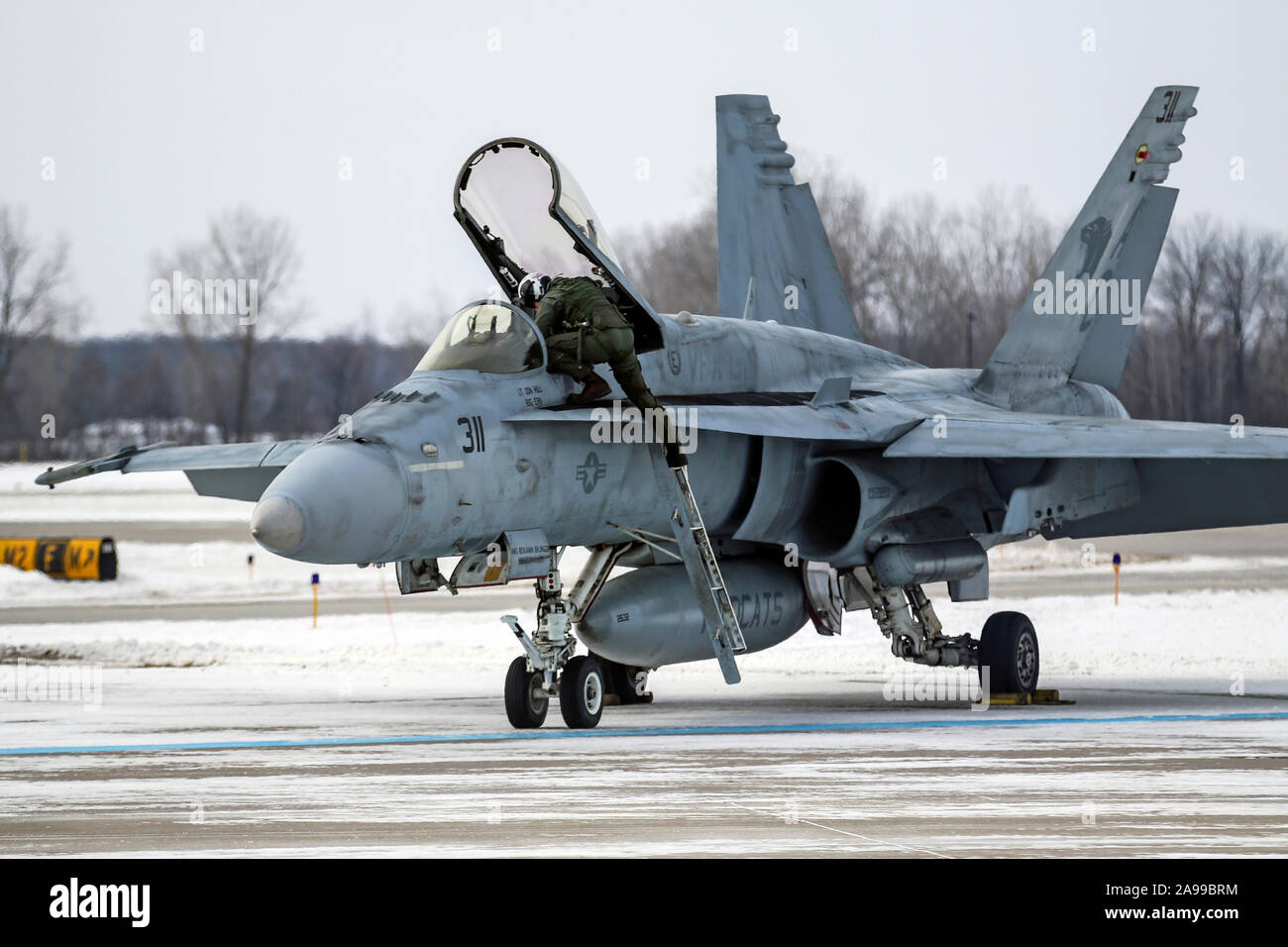 United States Navy F-18 Hornets prepare for a flyover during a Green ...