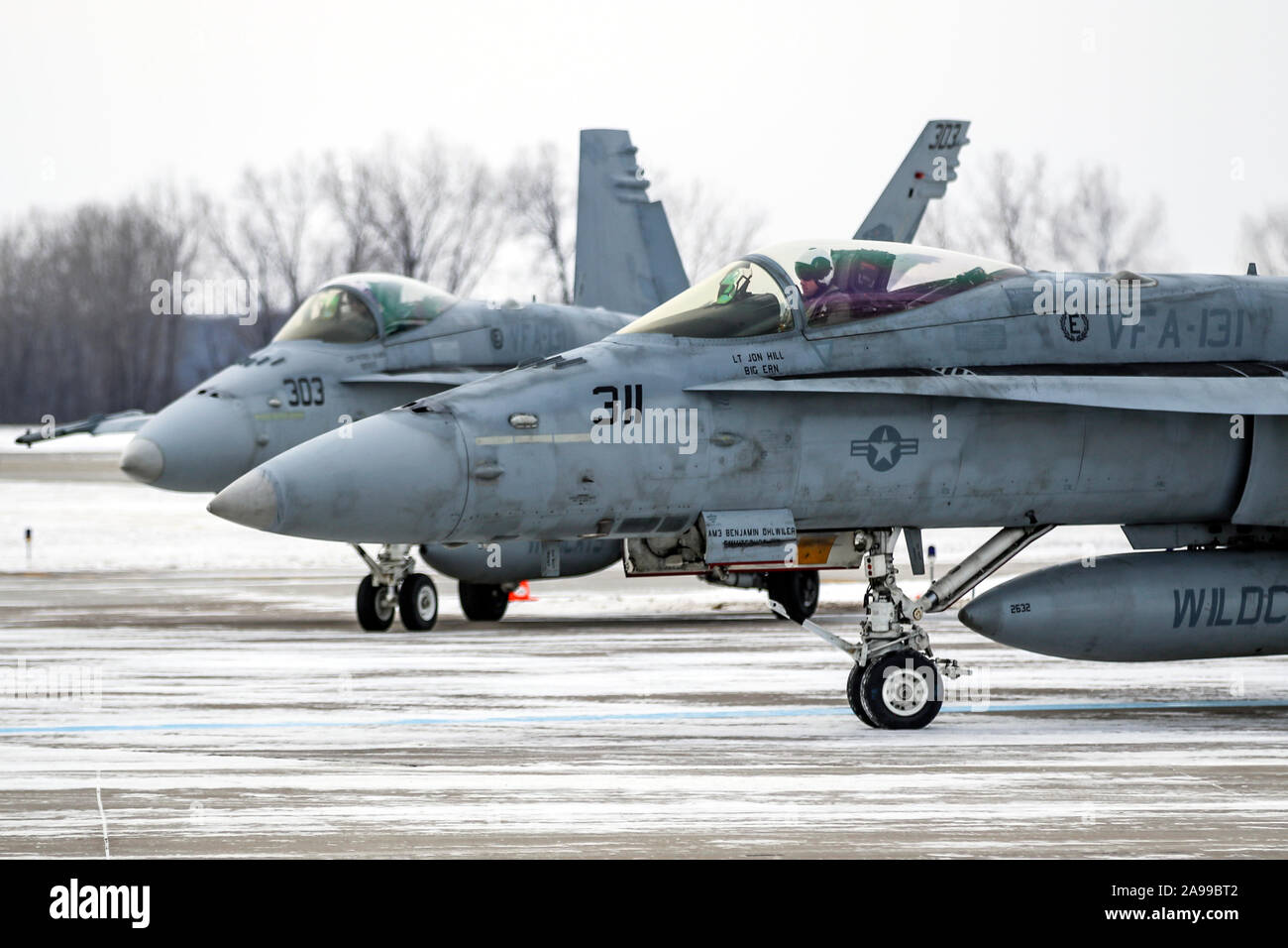 United States Navy F-18 Hornets prepare for a flyover during a Green ...