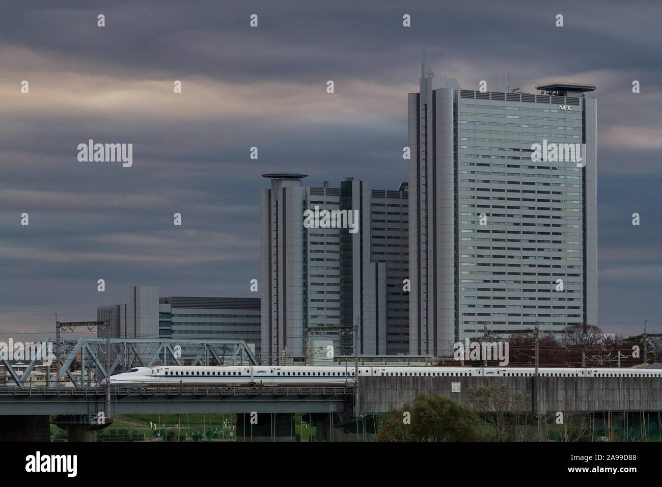 An N700 Series shinkansen (Bullet Train) on a bridge with the ...