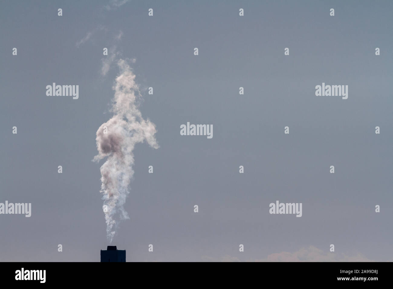 Steam smoke rising from chimney hi-res stock photography and images - Alamy