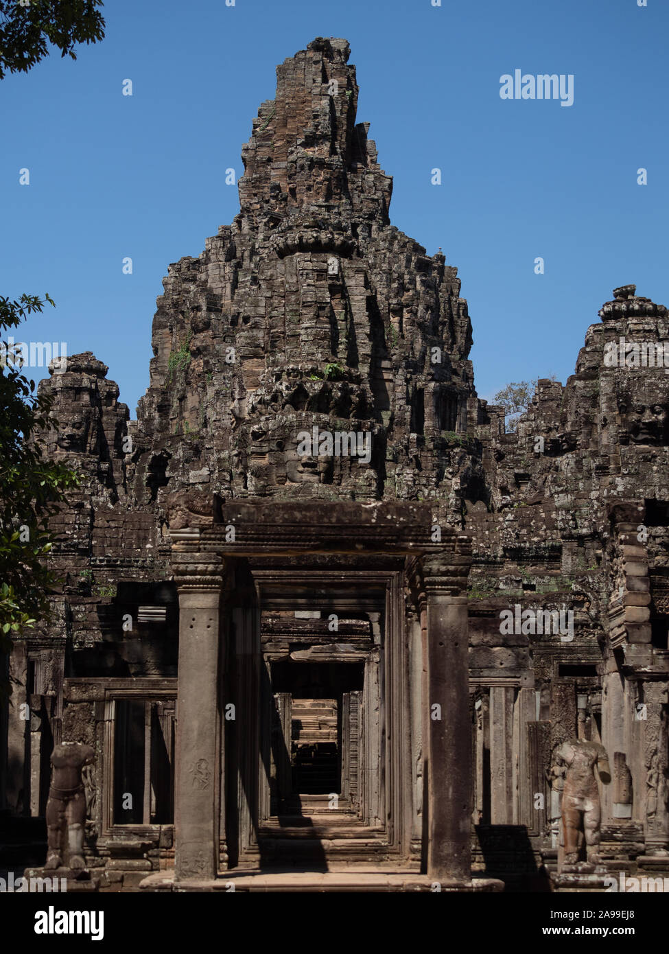 Face tower above the entrance into Bayon temple in the Angkor Thom ...