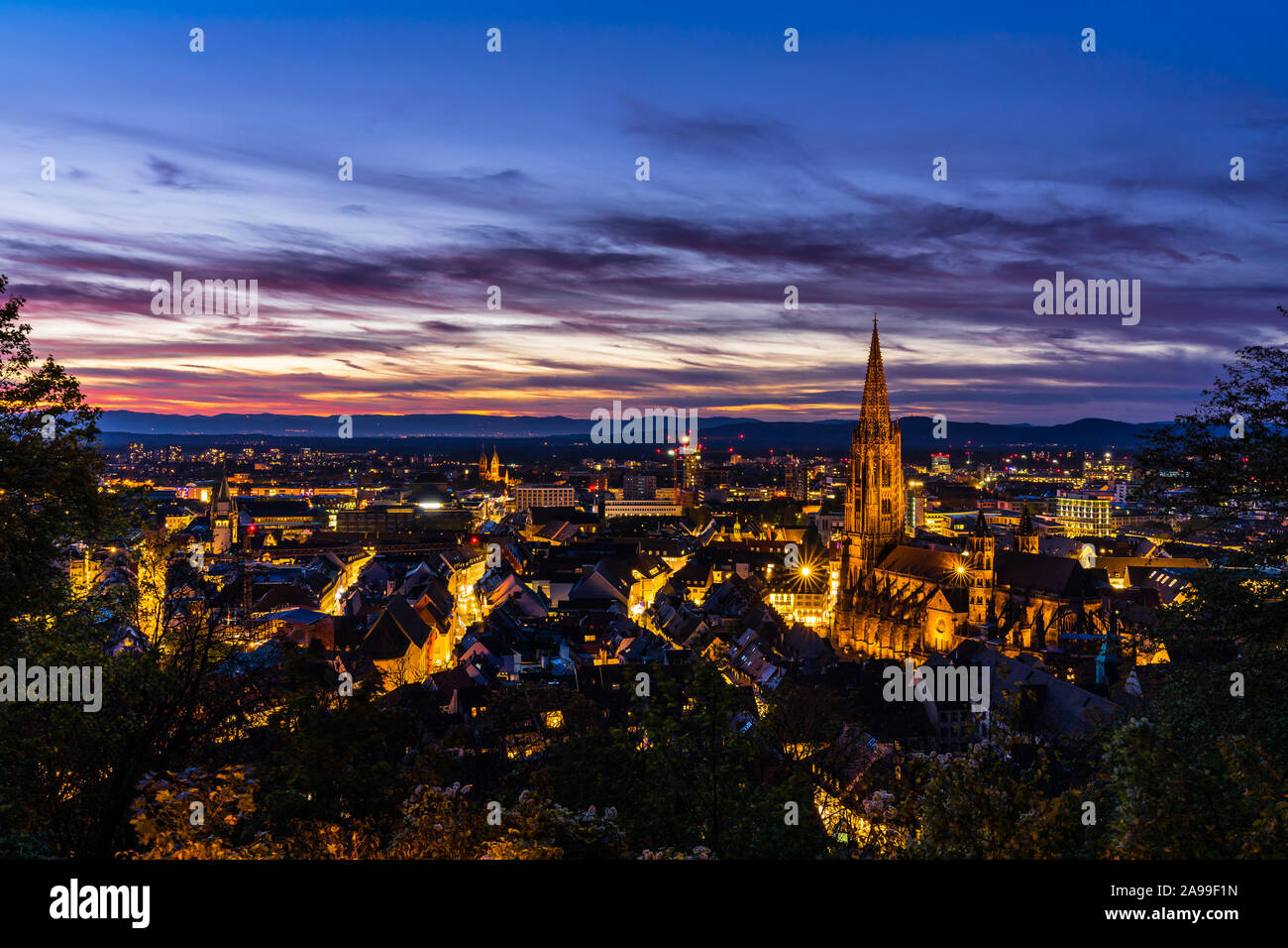 Germany, Illuminated night lights of skyline freiburg im breisgau ...