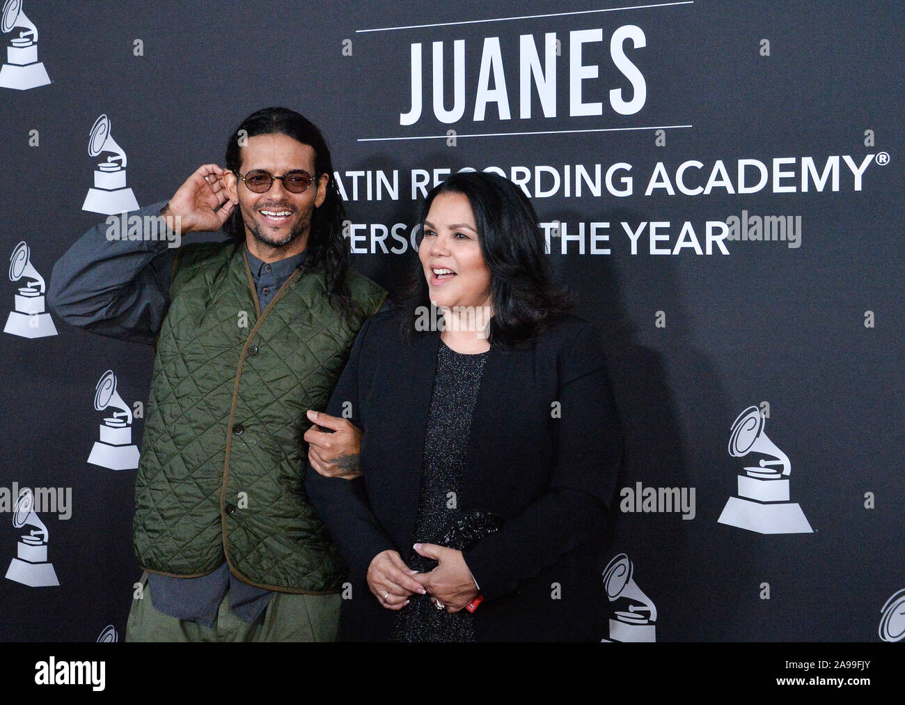 Las Vegas, United States. 13th Nov, 2019. Singer Draco Rosa (L) and his ...