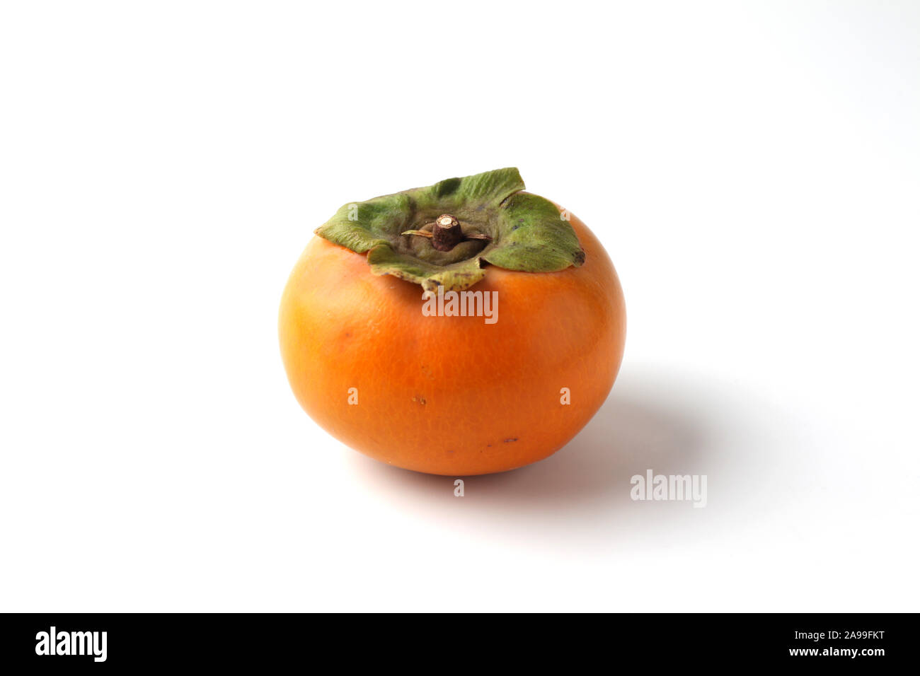 ripe persimmon isolated on white background Stock Photo - Alamy