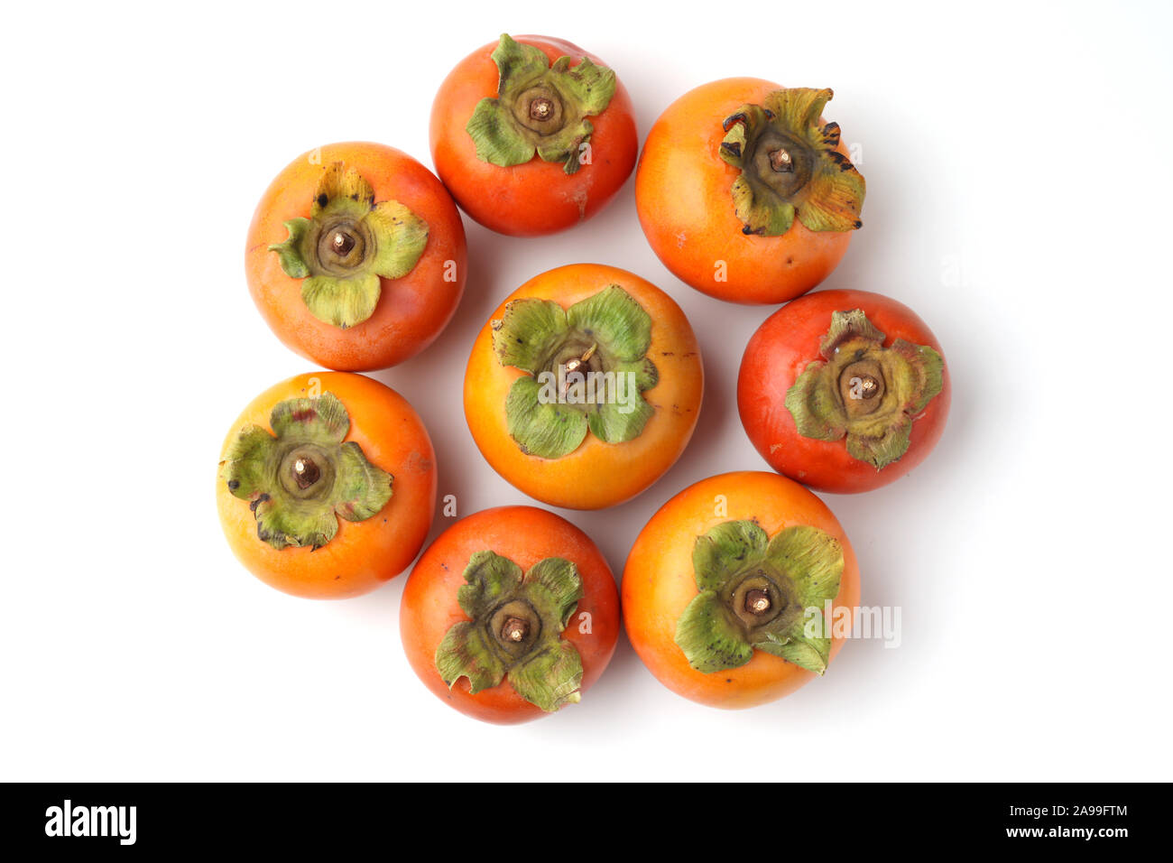 ripe persimmon isolated on white background Stock Photo - Alamy
