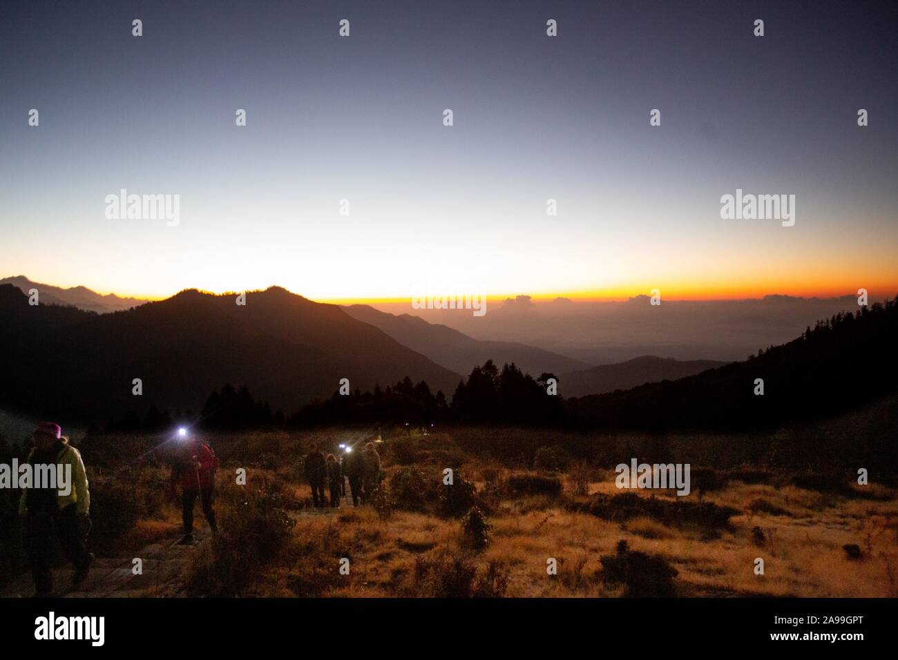 Ghorepani. 12th Nov, 2019. Tourists go trekking during sunrise at ...